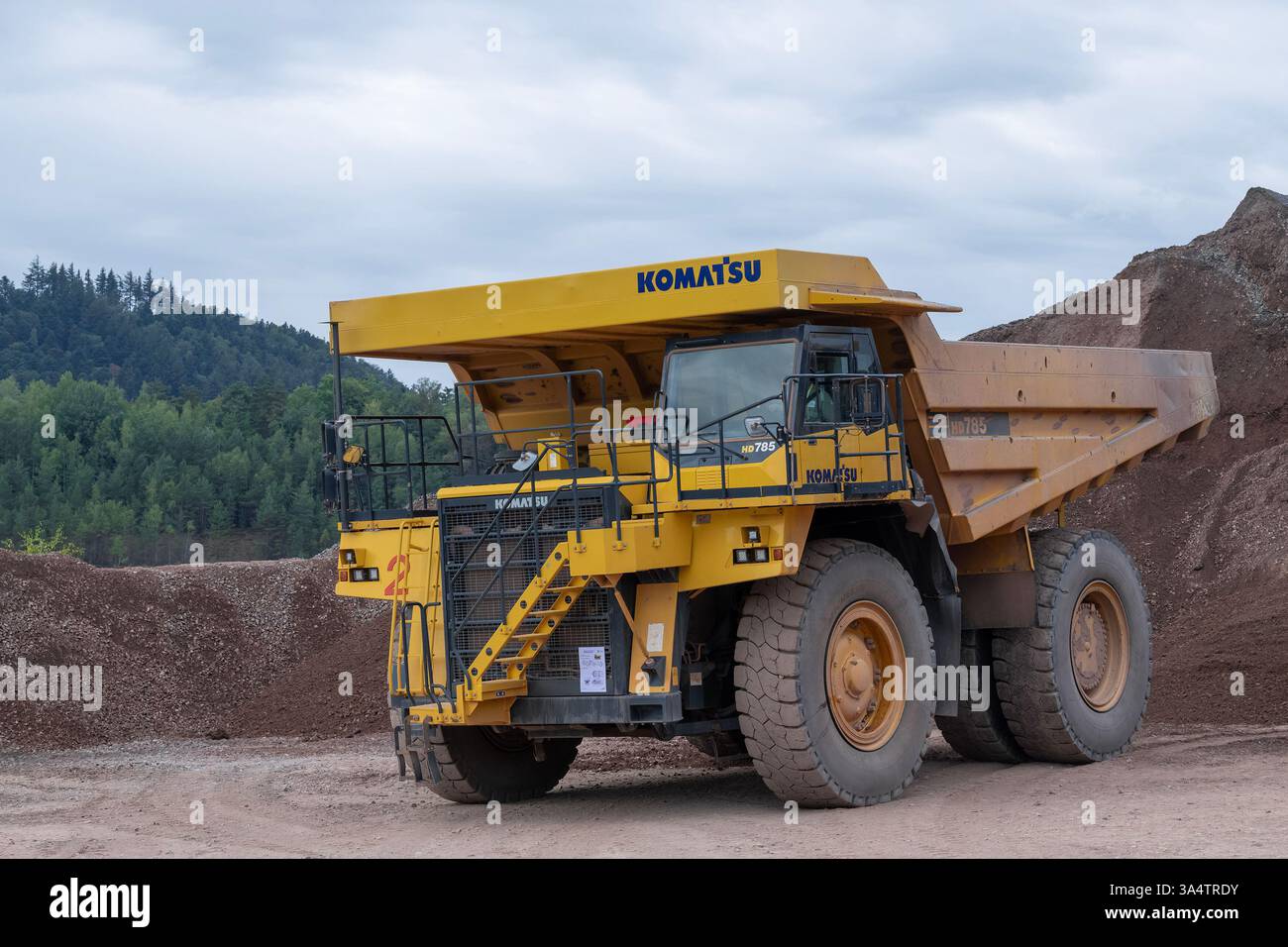 Raon-l'Étape, France - View on a yellow rigid dump truck Komatsu HD785 ...