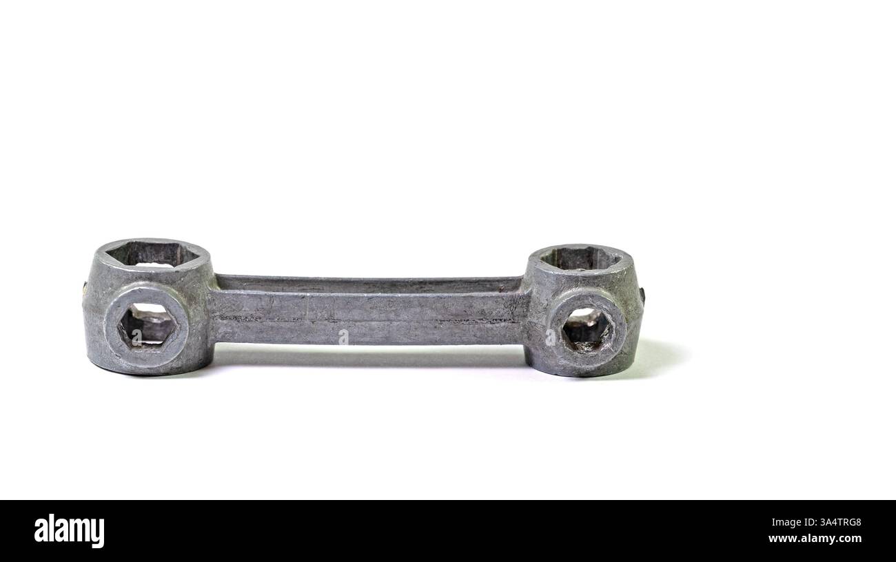 Bone wrench for bicycle repair against a white background Stock Photo ...