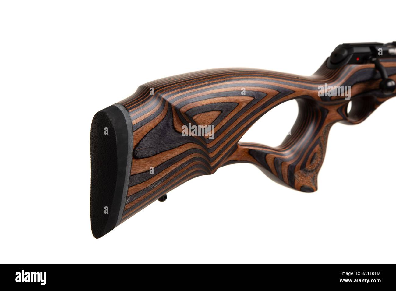 A close-up of a .22lr small-caliber rifle with a sleek laminated wood ...