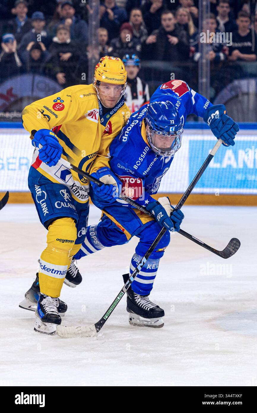 PostFinance top scorer Adam Tambellini (HC Davos) and Mike Kunzle #73 ...