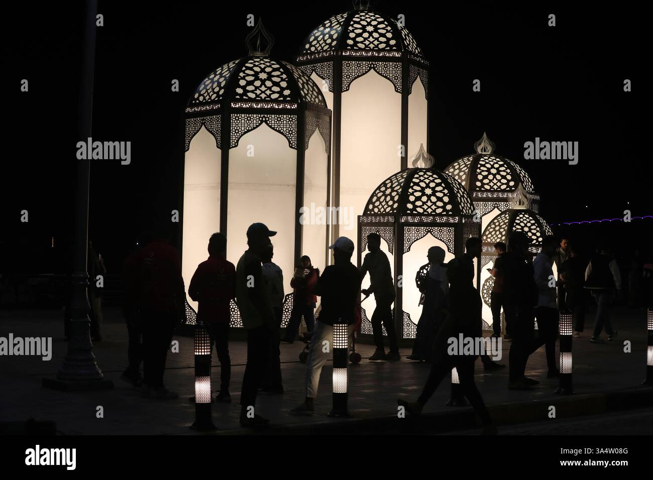 People enjoy a picnic on the bank of the Shatt al-Arab waterway in ...