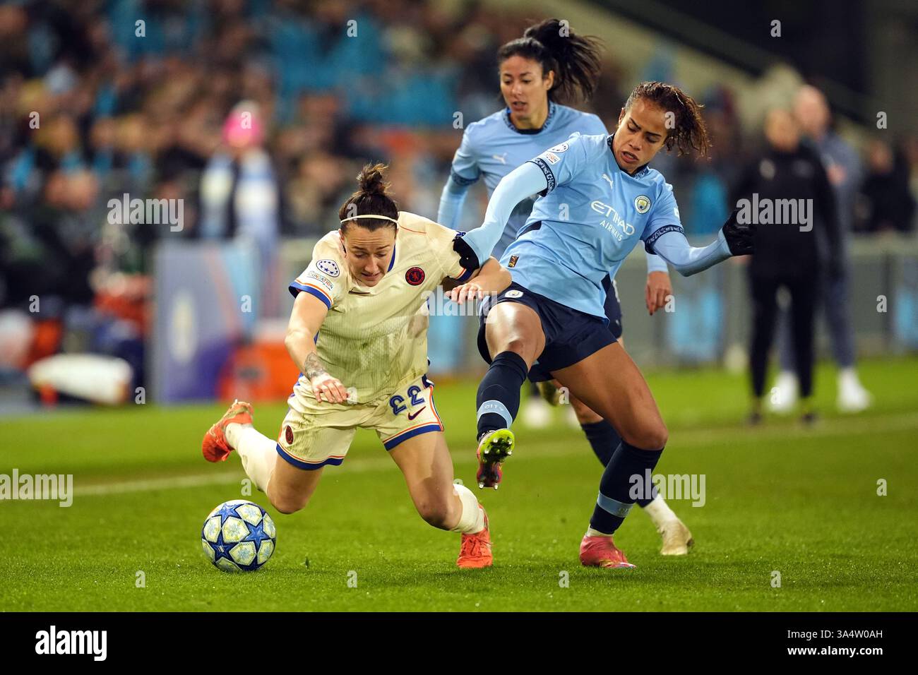 Chelsea's Lucy Bronze (left) and Manchester City's Mary Fowler battle ...