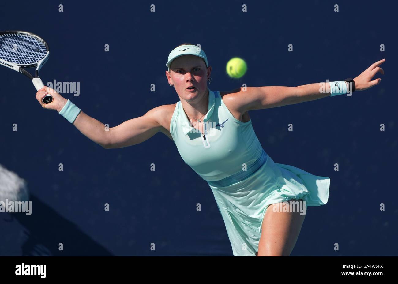 Suzan Lamens, of the Netherlands, hits a return to Moyuka Uchijma, of ...