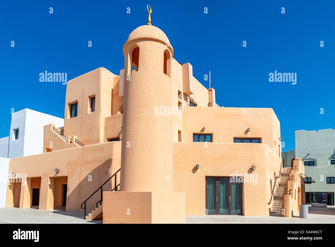 Colorful Mina village district street with modern traditional arab ...