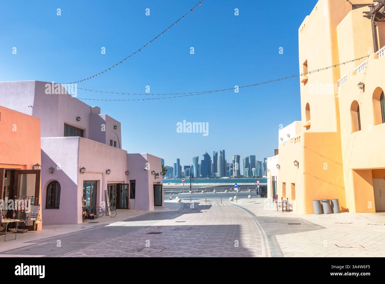 Colorful Mina village district street with arab traditional shaped ...