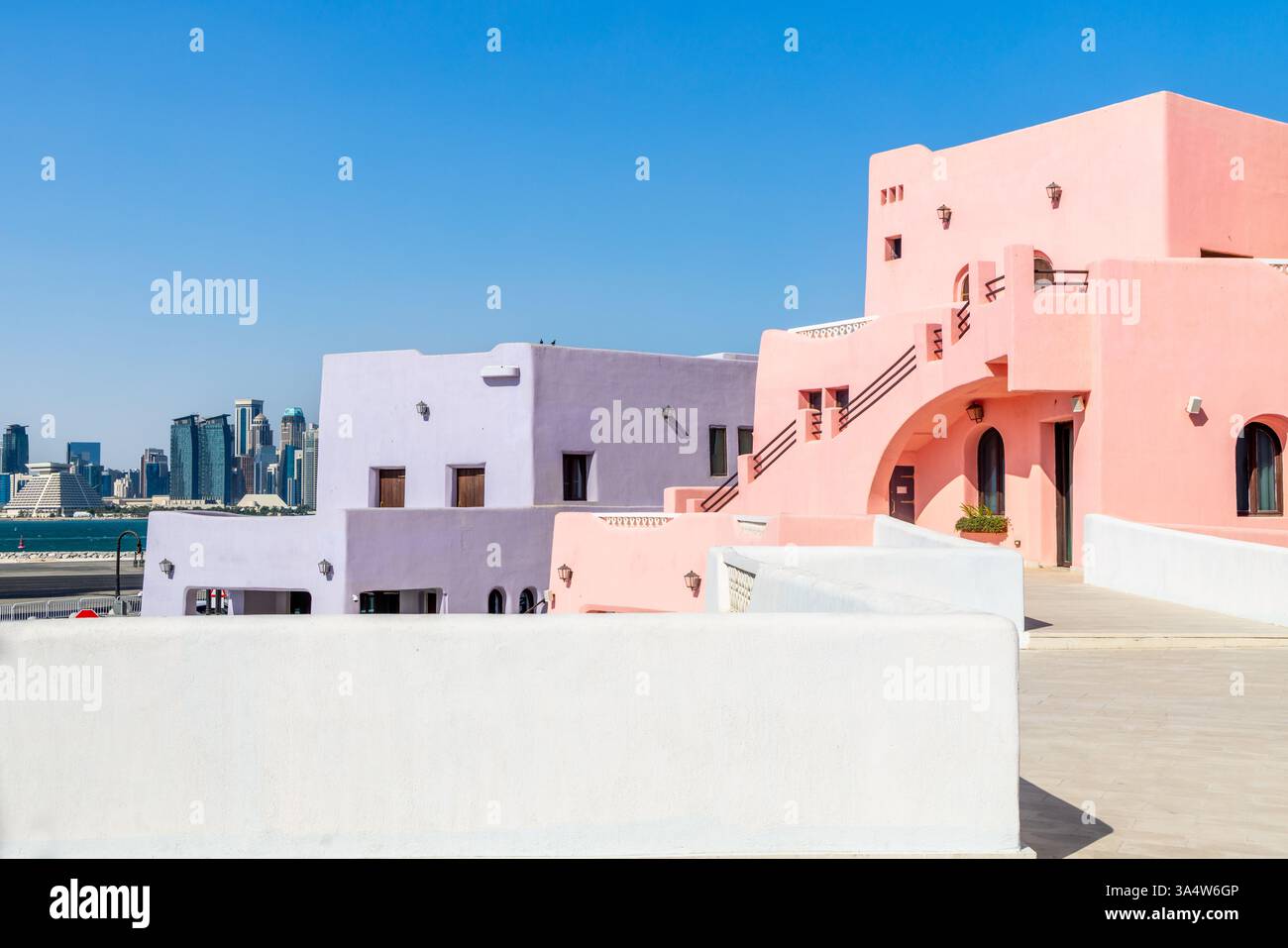 Colorful Mina village district street with arab traditional shaped ...