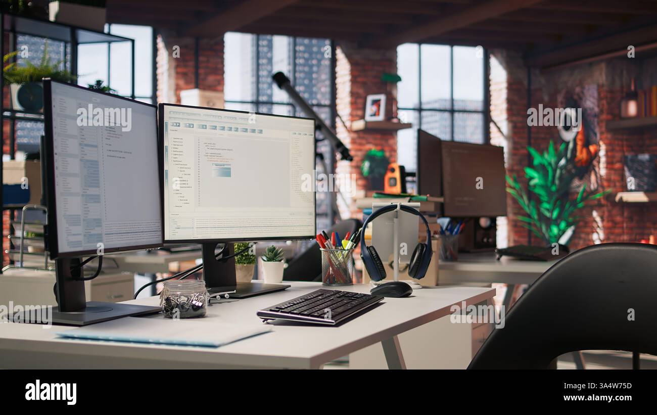 PC display on startup office desk showing programming languages written ...