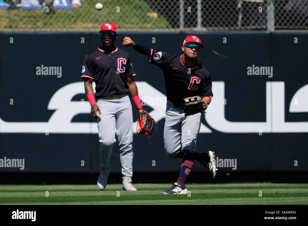 Cleveland Guardians' Tyler Freeman fields a base hit by Los Angeles ...