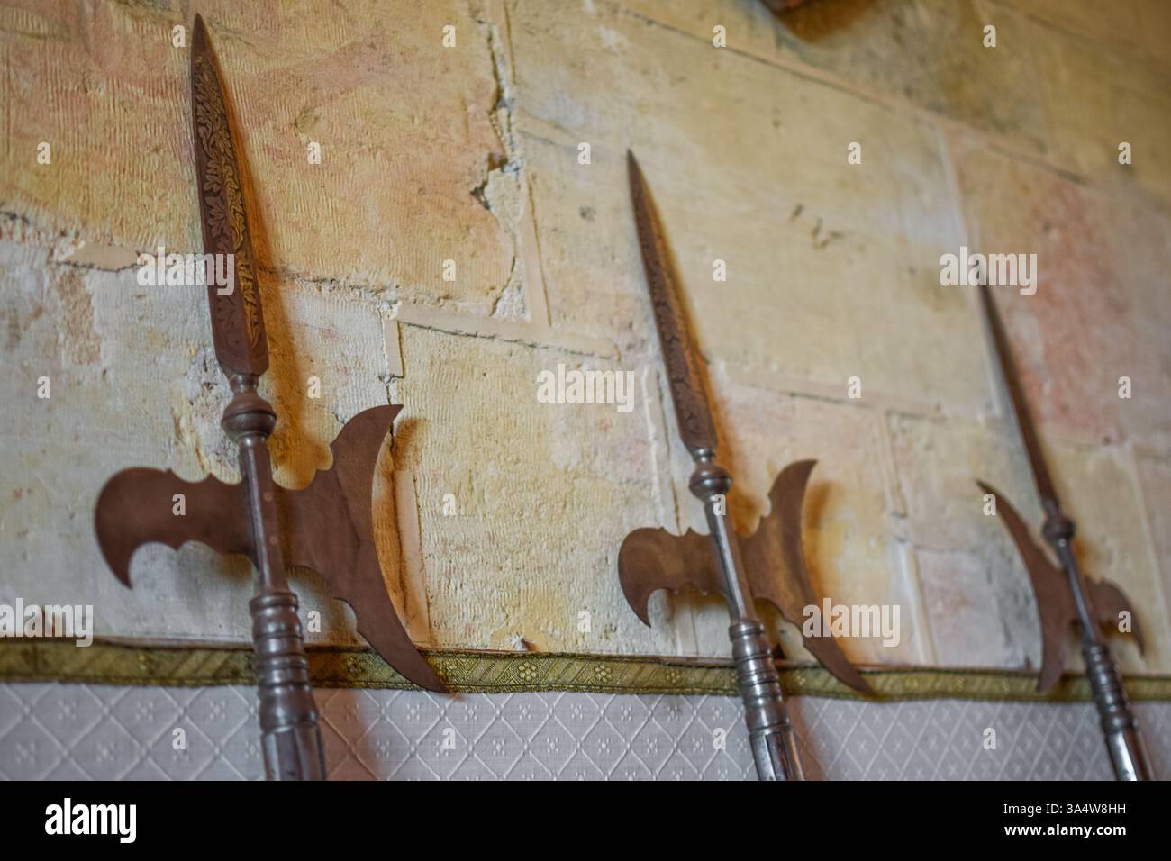 Set of Medieval Pikes Exposed with Limestone Background of Castle wall ...