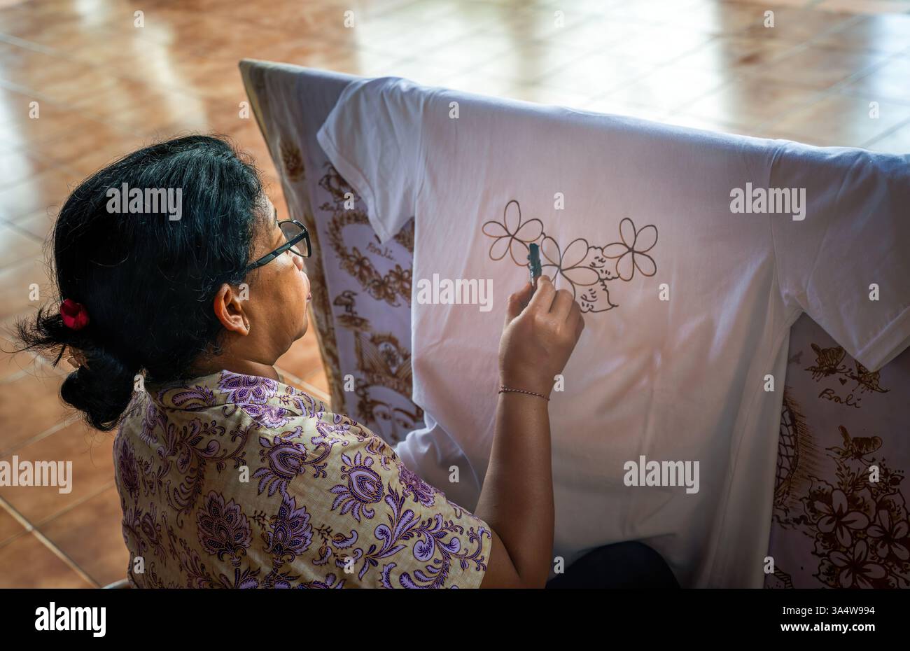 Skilled woman drawing decorative patterns hi-res stock photography and ...