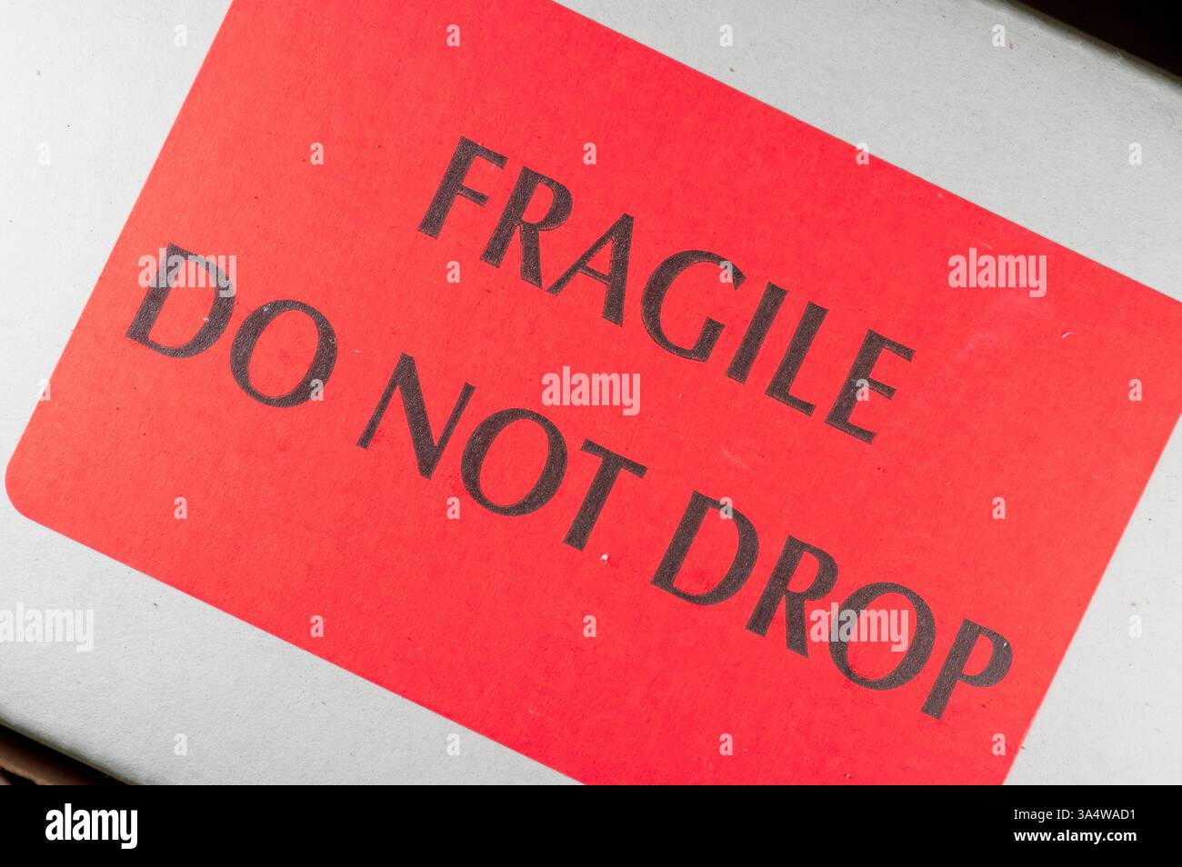 Faded label for a fragile shipment Stock Photo - Alamy