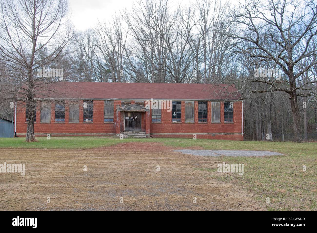 Abandoned brick school building on a cloudy day Stock Photo - Alamy