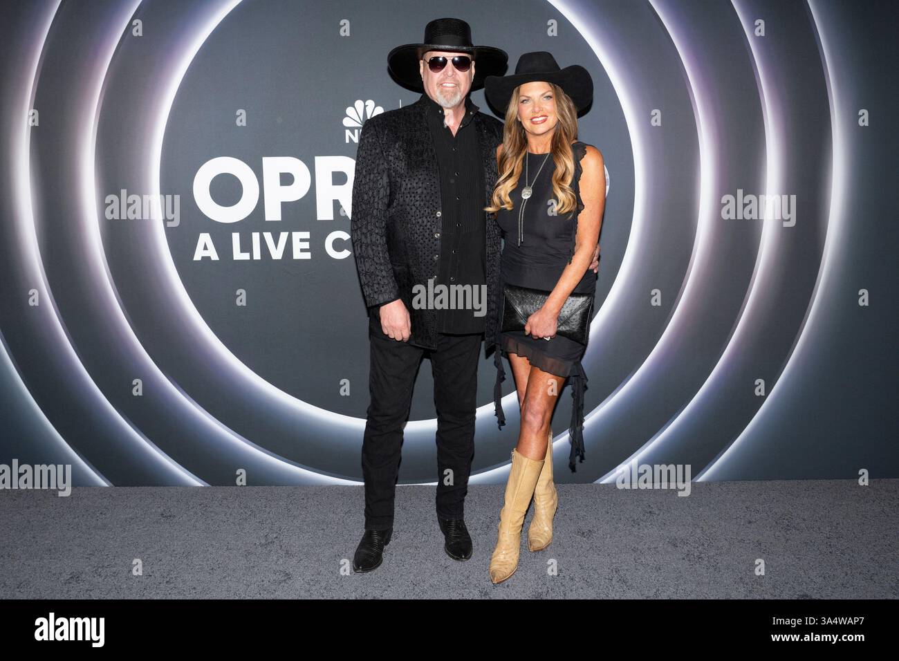 Eddie Montgomery, left, and Jennifer Belcher arrive at "Opry 100: A ...