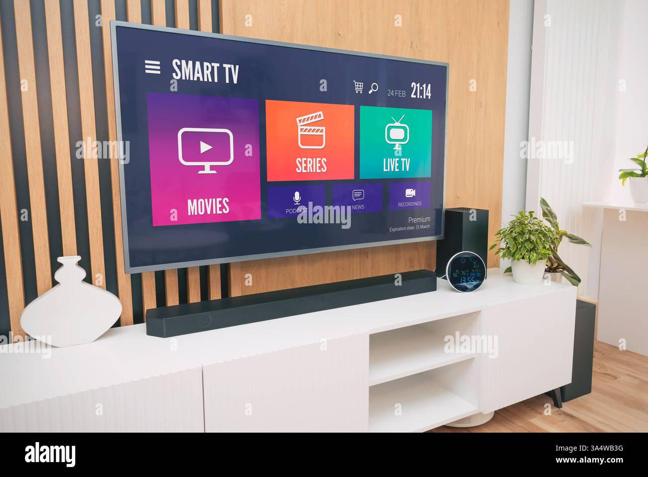 Modern living room and TV set with multimedia app UI Stock Photo - Alamy