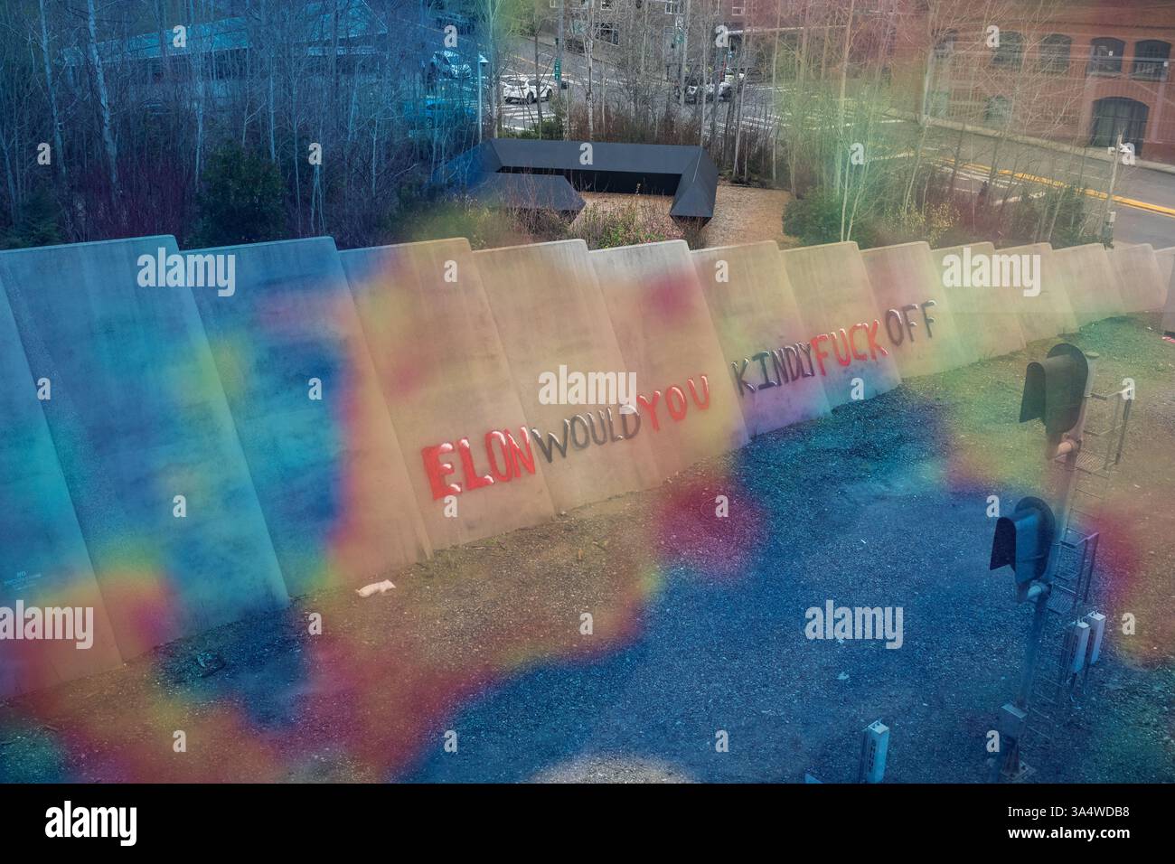 Seattle, USA. 19th Mar 2025. Anti Elon Musk graffiti on the Seattle ...