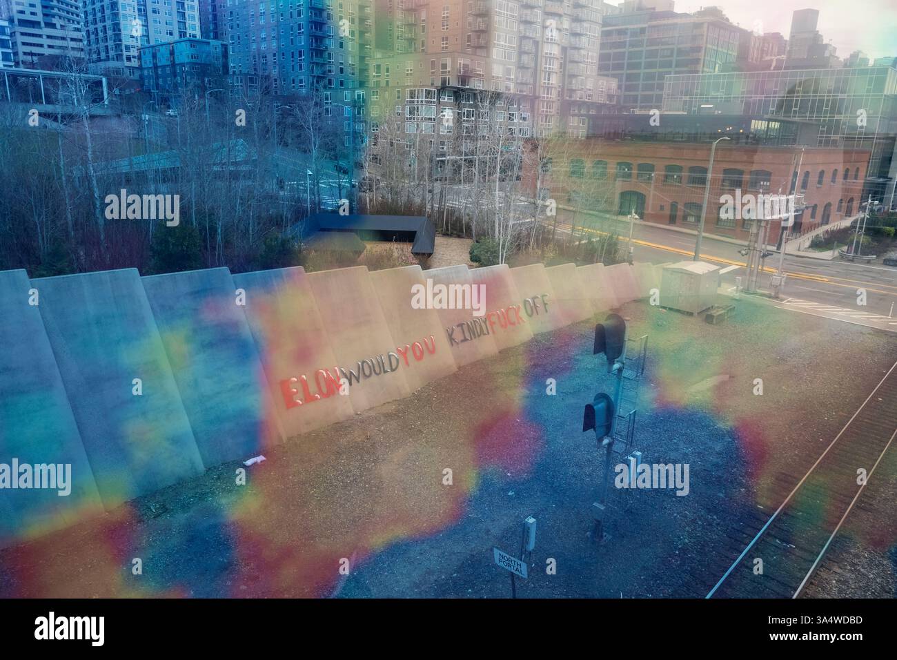 Seattle, USA. 19th Mar 2025. Anti Elon Musk graffiti on the Seattle ...
