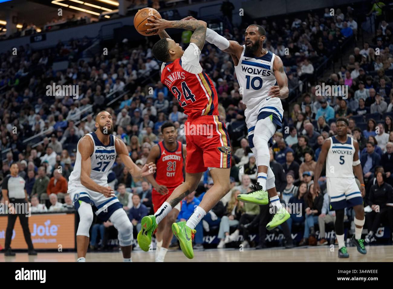 New Orleans Pelicans guard Jordan Hawkins (24) is fouled by Minnesota ...