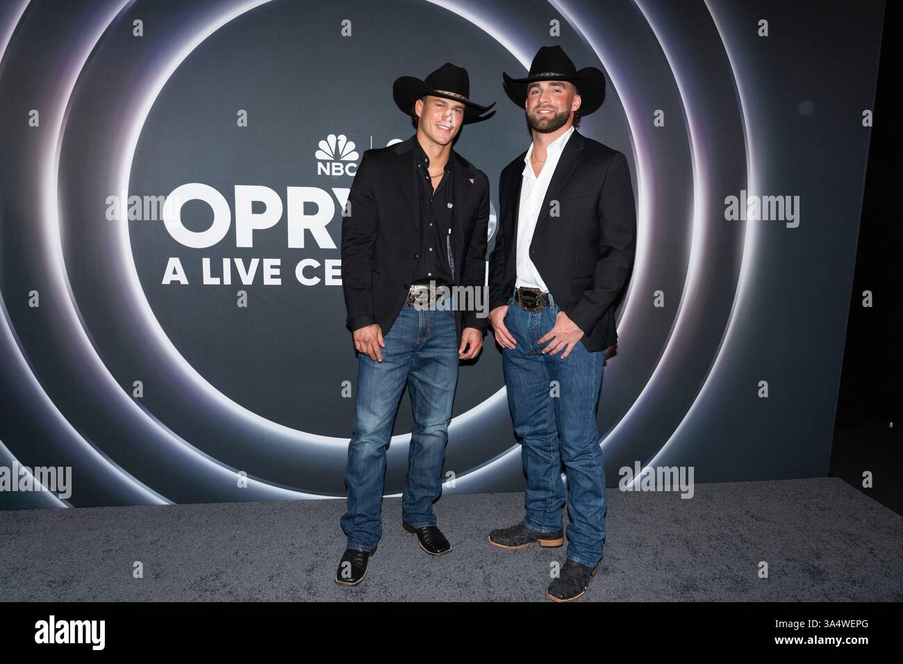 Mark Estes, left, and Kaleb Campbell Winterburn arrive at "Opry 100: A ...