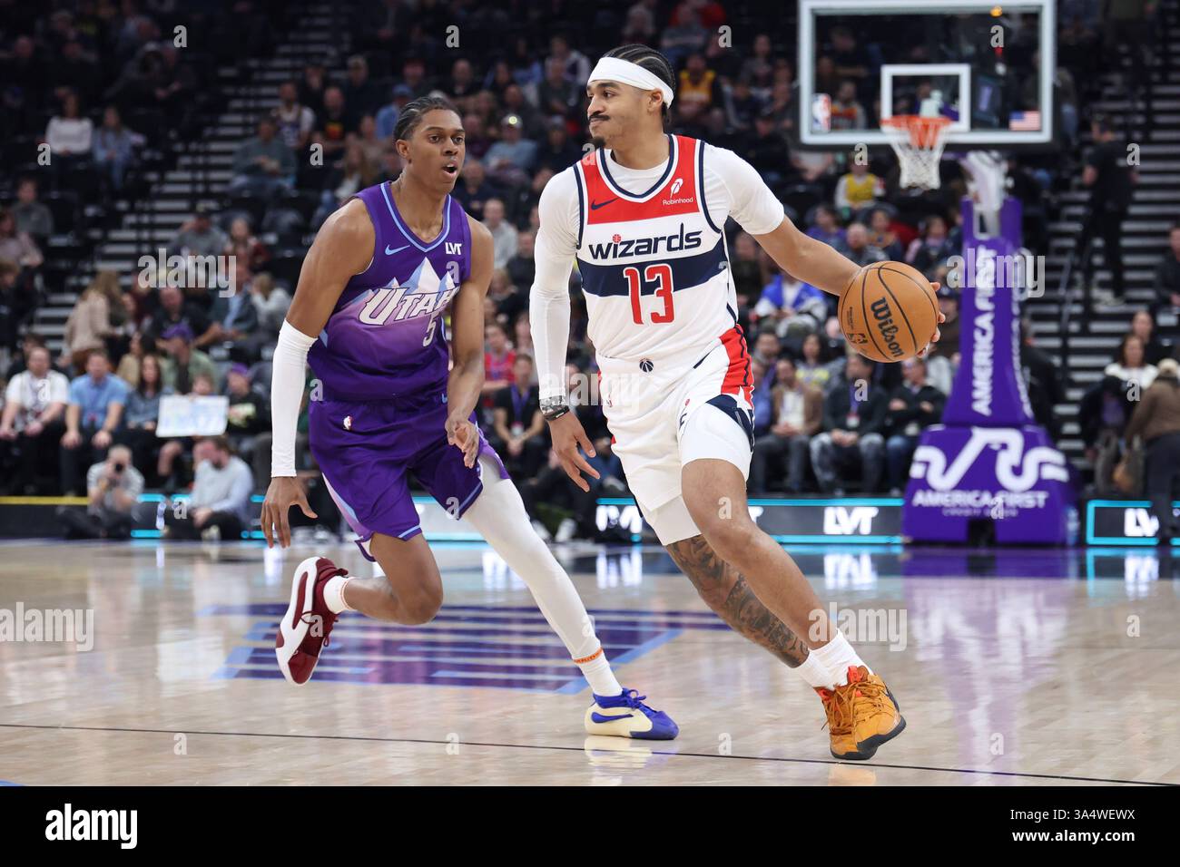 Washington Wizards guard Jordan Poole (13) moves the ball against Utah ...