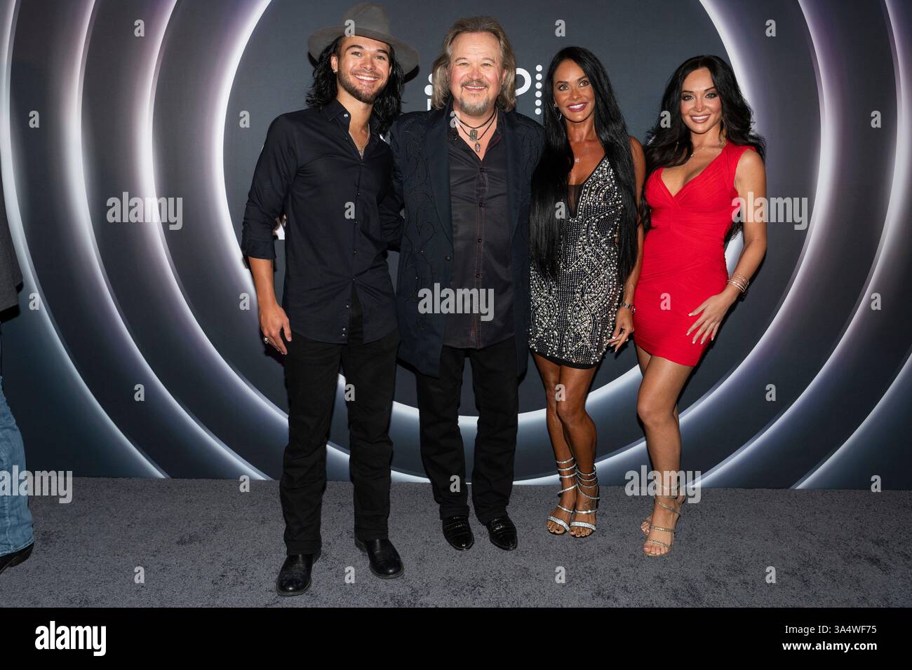 Tristan James, from left, Travis Tritt, Teresa Tritt, and Tyler Reese ...