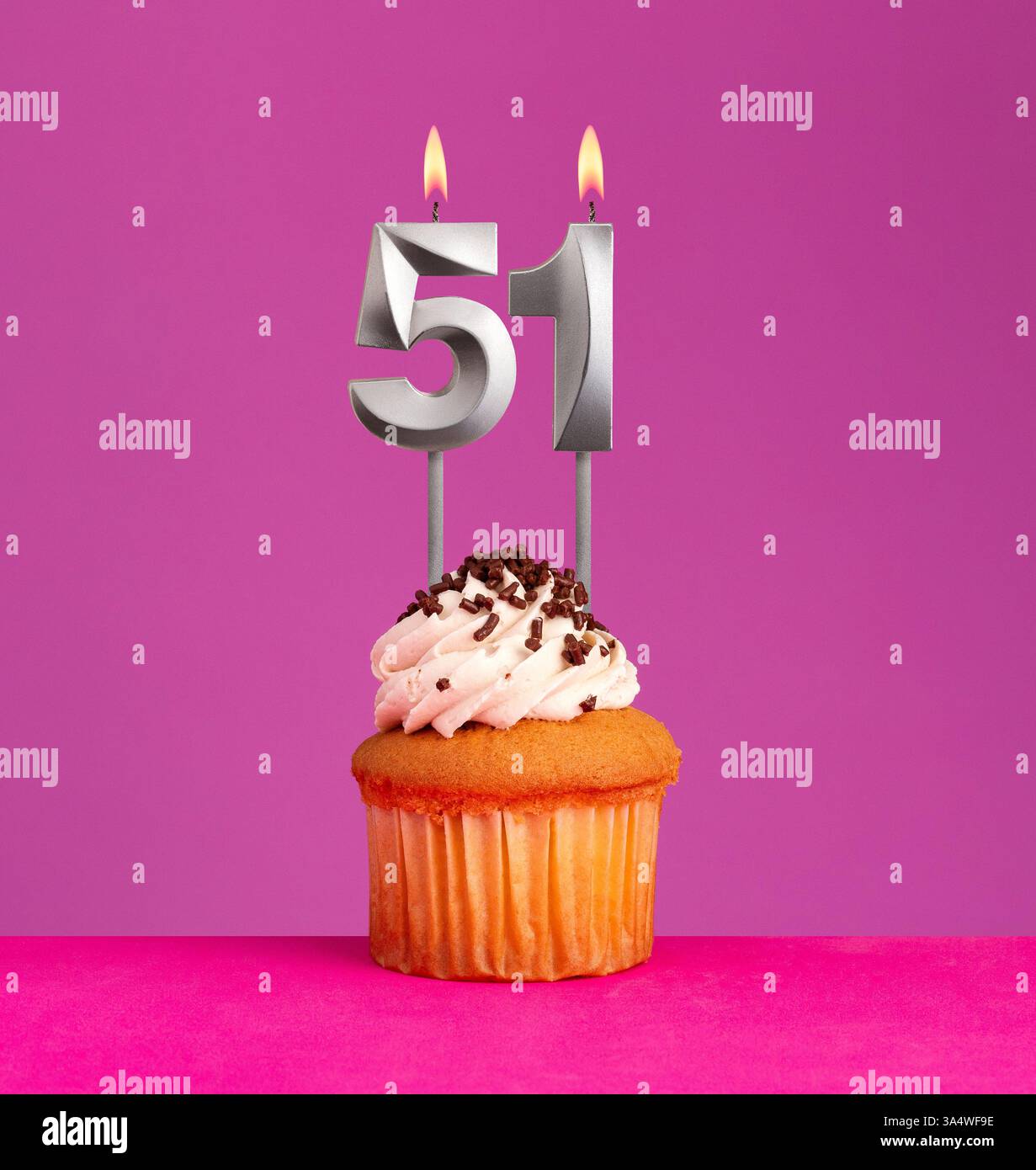 Birthday candle number 51 with cupcake on violet background Stock Photo ...