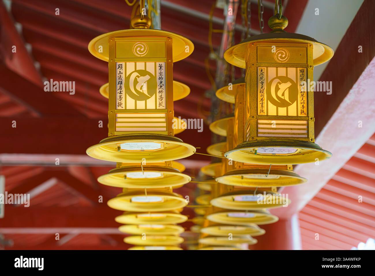Osaka, Japan - Sep 21 2024, close up view of golden ritual lanterns ...