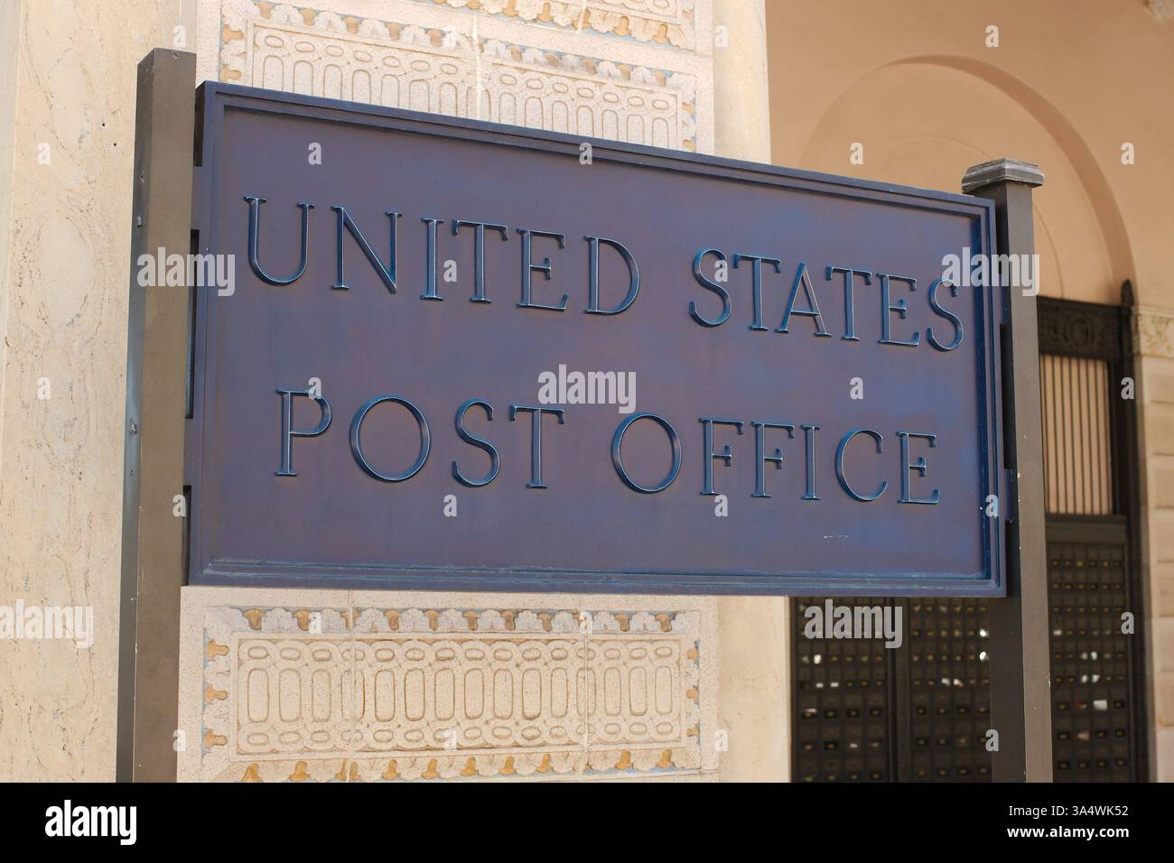 Editorial Use Only March 17, 2025 St. Petersburg, FL, USA. Wall plaque sign for The U.S. Post ...