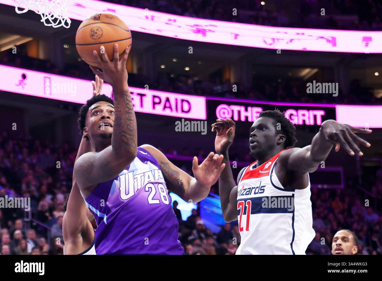 Utah Jazz forward Brice Sensabaugh (28) lays the ball up against ...