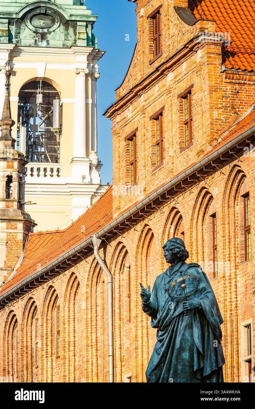 the iconic Nicolaus Copernicus Monument in Torun's Old Town Market, a ...