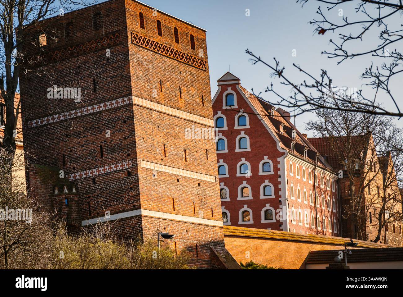 Medieval tower stands tall amidst the vibrant architecture of Torun ...