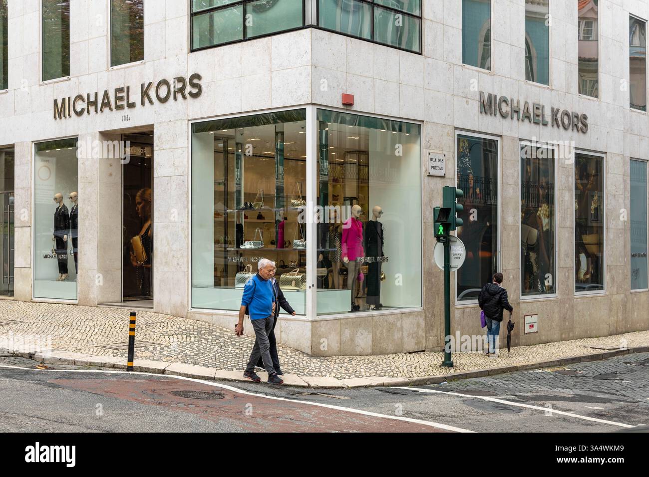 Michael Kors letters logo above entrance the shop window. Michael David ...