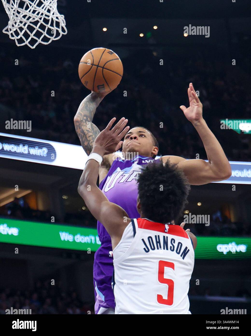 Utah Jazz guard Keyonte George, back, dunks against Washington Wizards ...