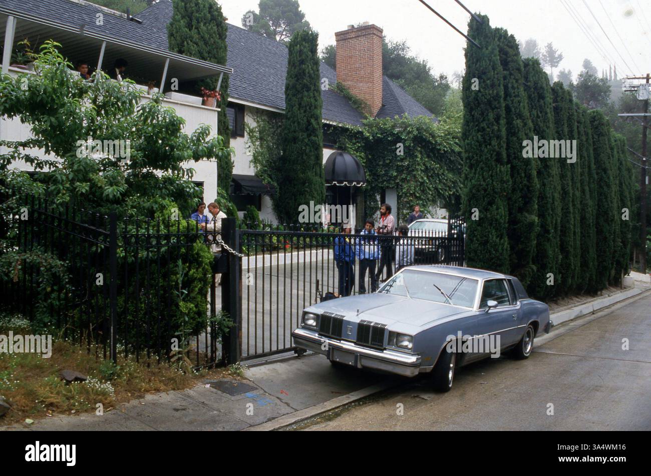 A car seen blocking the driveway of Peter Holm's and Joan Collins ...