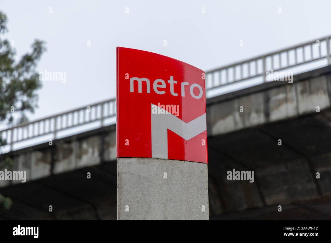 Metro sign logo next to a subway station in Lisbon, M stands for Metro ...
