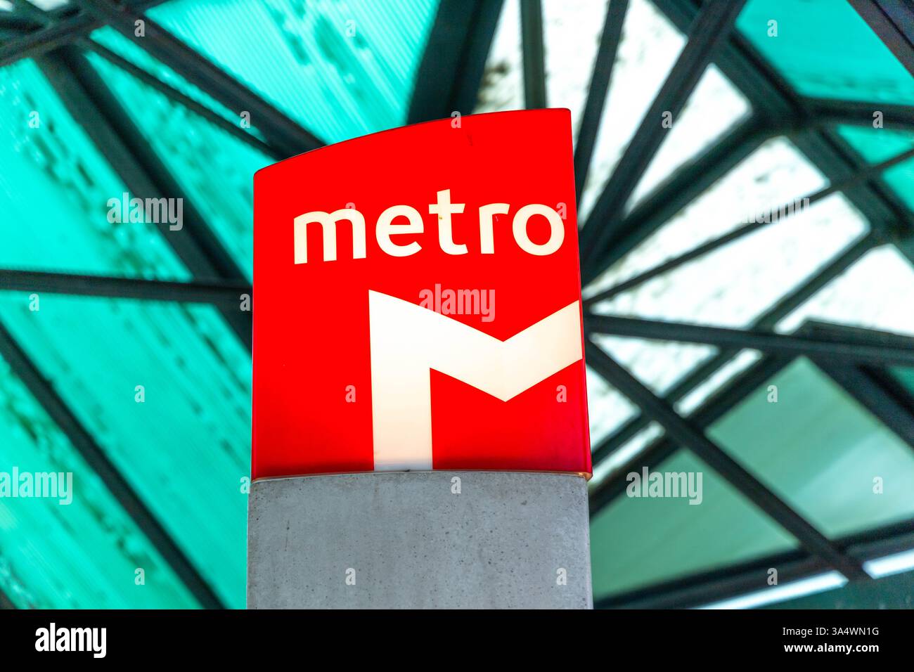 Metro sign logo next to a subway station in Lisbon, M stands for Metro ...