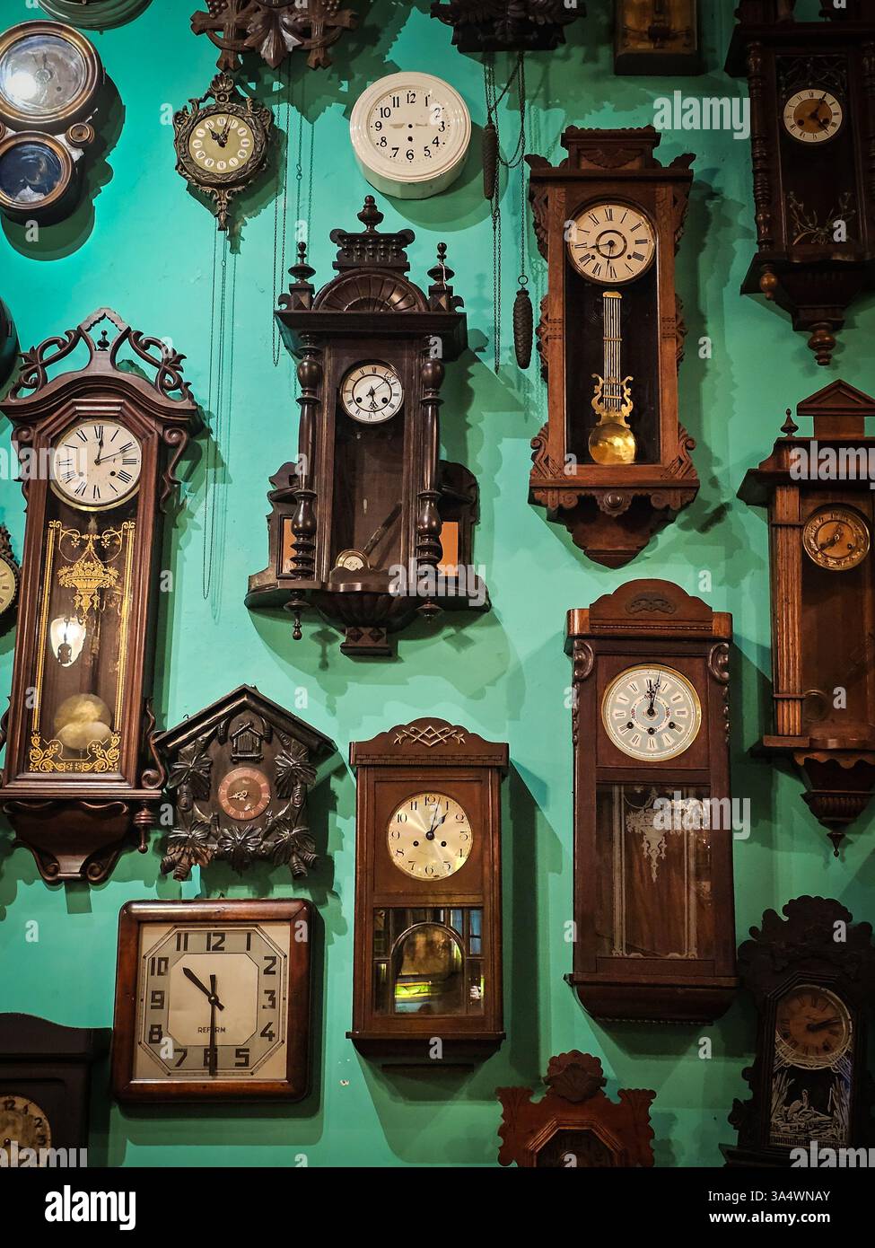 Aged wooden wall clocks hi-res stock photography and images - Alamy