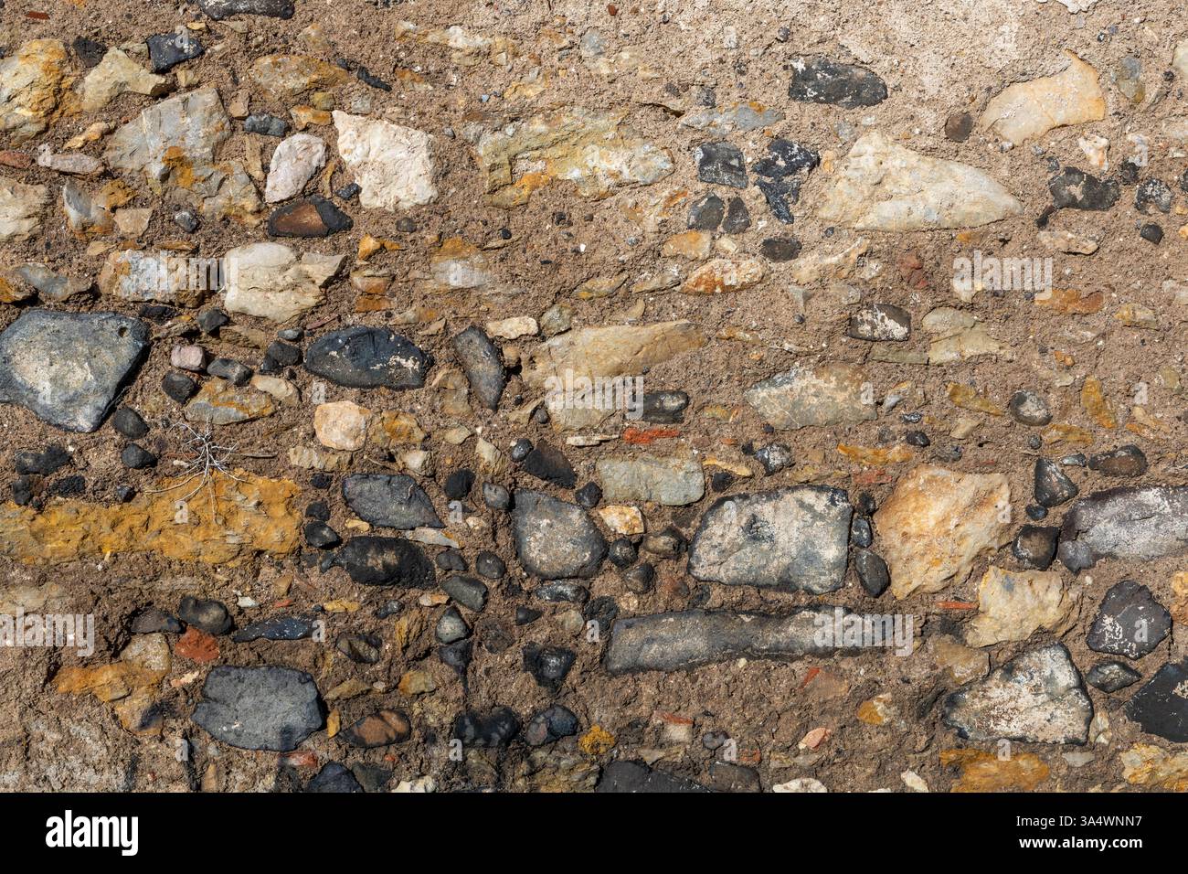 Ancient building closeup of surface brick wall concrete plaster of an ...