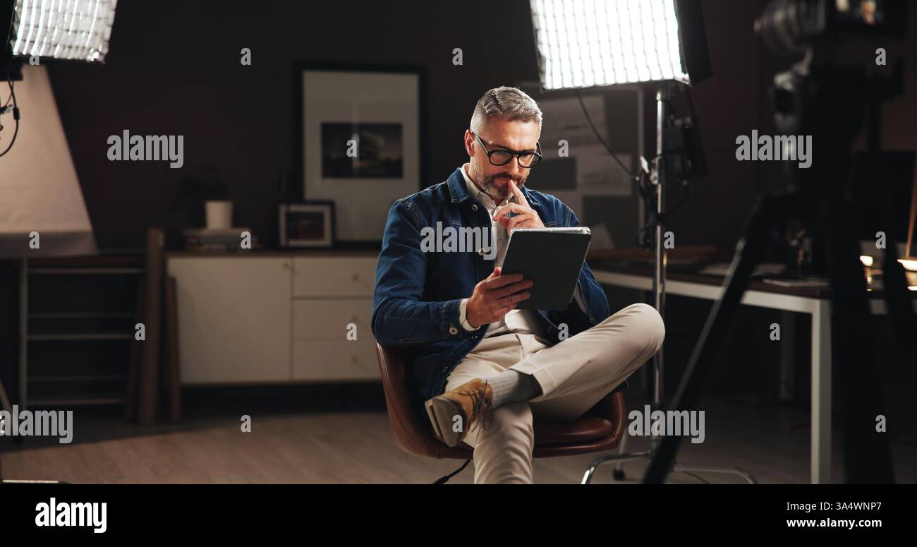 Talk show host, man and tablet in home studio for live streaming ...