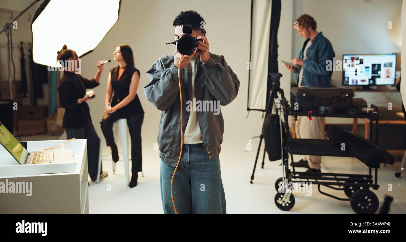 BTS, camera and shooting with photographer man in studio catalog or ...