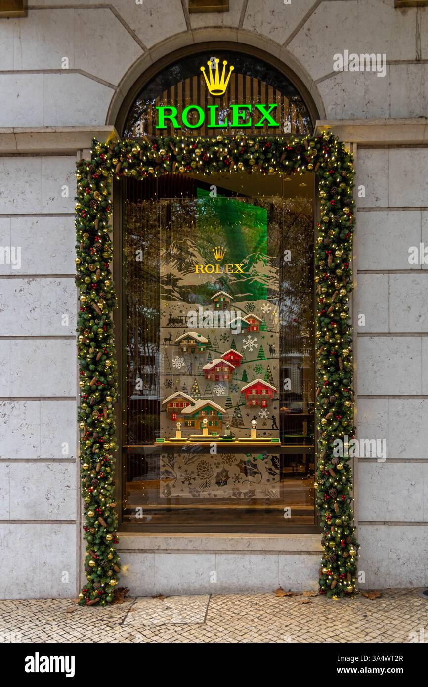 Rolex logo sign, green Rolex letters with gold yellow crown. Rolex SA ...