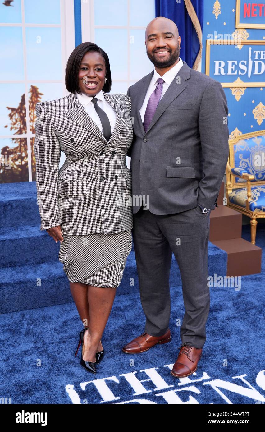 Uzo Aduba and her husband Robert Sweeting pose together at the premiere ...