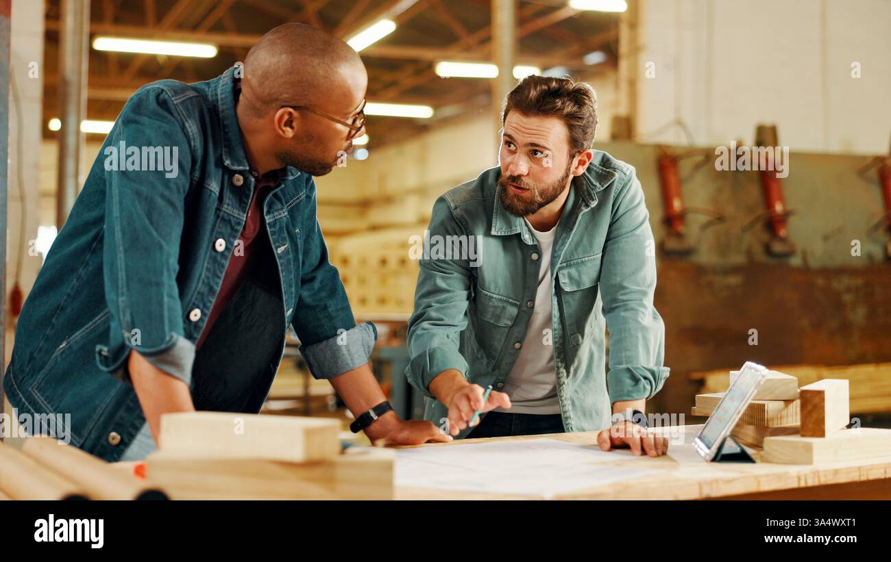 Carpentry, meeting and men in workshop for woodwork on furniture ...
