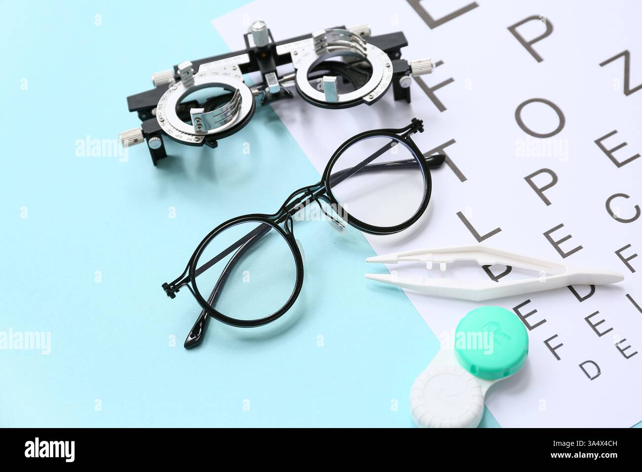 Optical trial frame with eye test chart, eyeglasses and set for contact ...