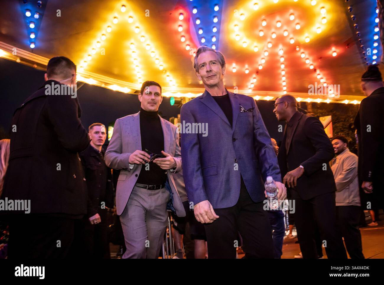 Actors Ben Mendelsohn and Dan Marotte walk into the theater for the ...