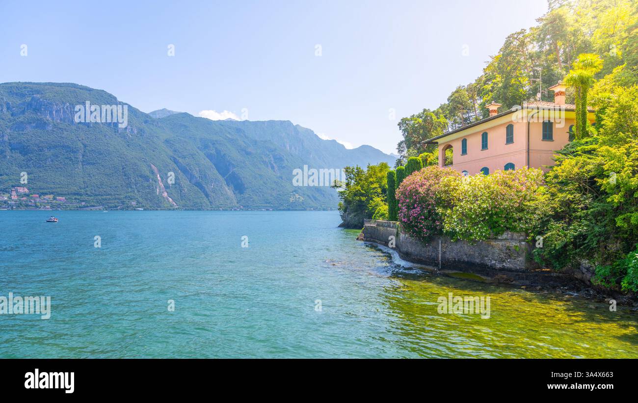 A charming villa overlooks the tranquil waters of Lake Como, surrounded ...