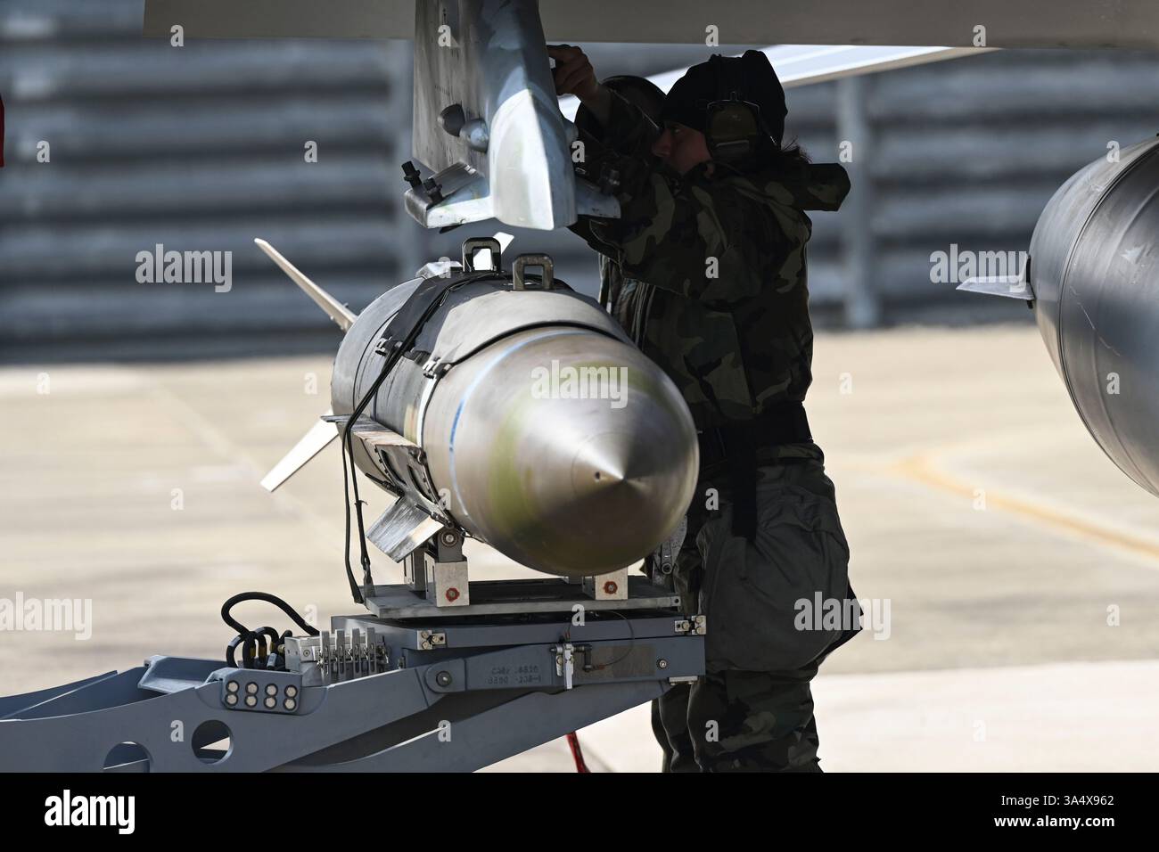 U.S. Air Force Staff Sgt. Anthony Godlewski and Airman 1st Class Joselyne Jacobo, 35th Fighter ...