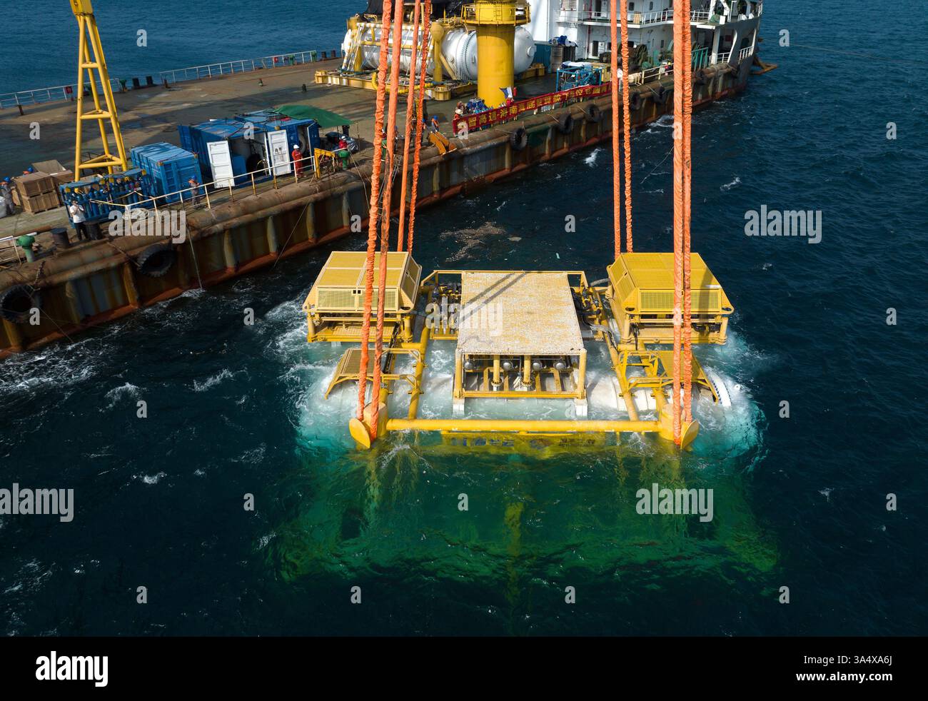 Lingshui. 20th Mar, 2025. A drone photo taken on Feb. 18, 2025 shows Hainan's commercial ...