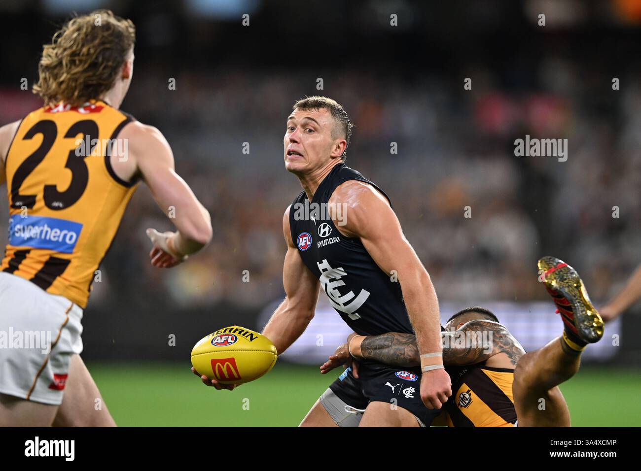 Patrick Cripps of Carlton (centre) in action during the AFL Round 2 ...