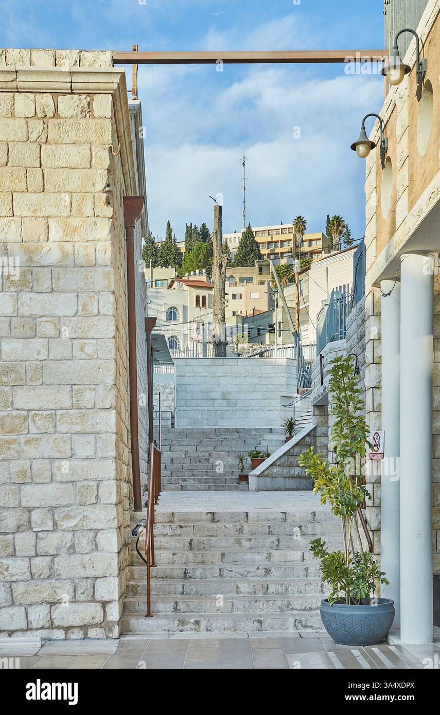 A stone pathway leading to a historic religious site, surrounded by ...
