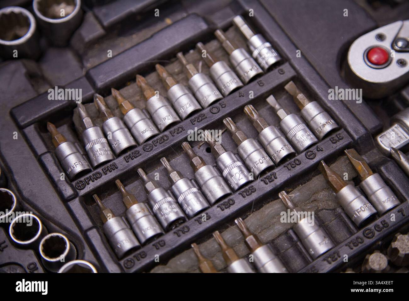 Set of bits and socket heads for automotive tools (Phillips, slotted ...